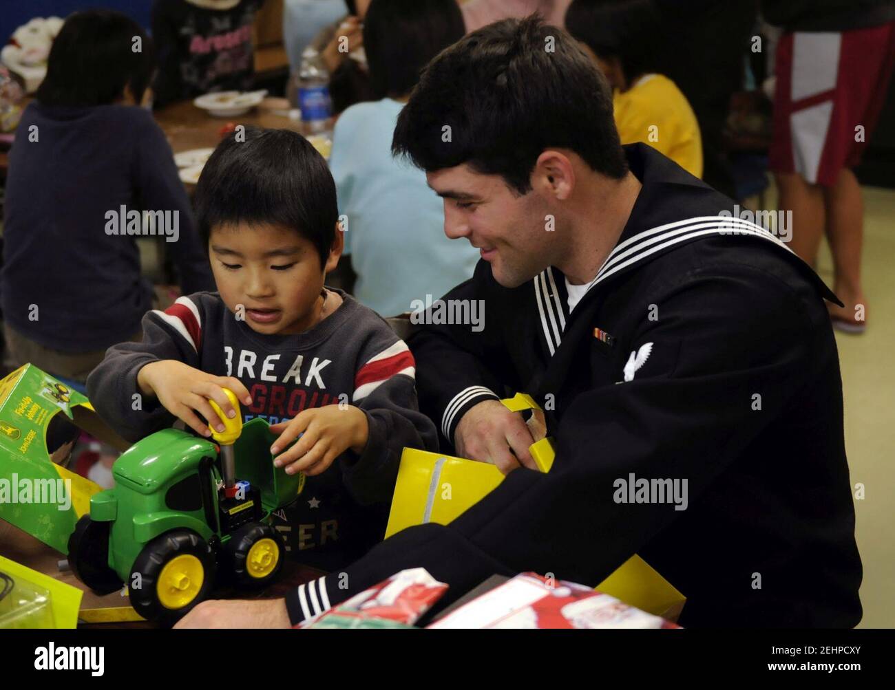 Passing out gifts hi-res stock photography and images - Alamy