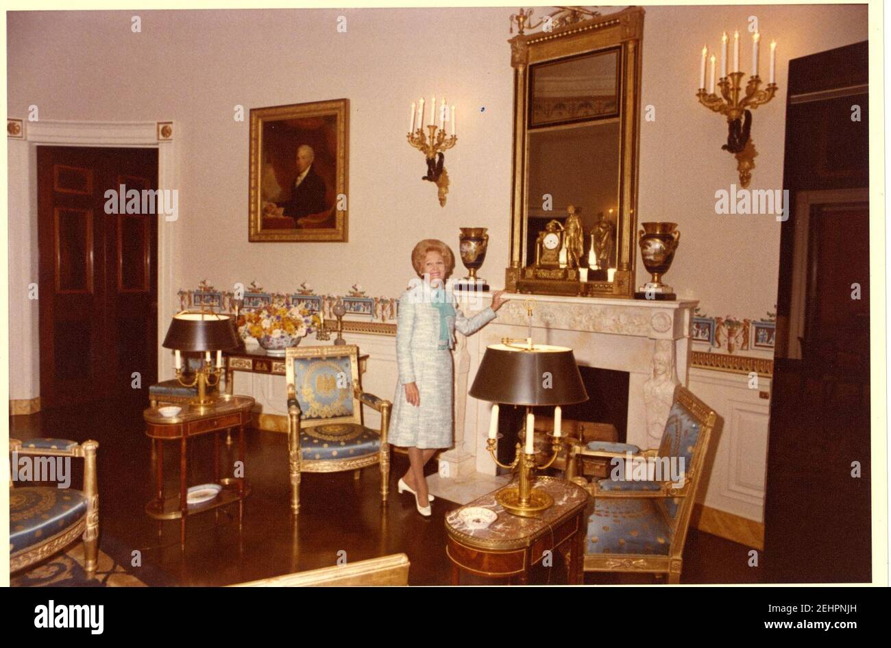 Pat Nixon Standing in the Blue Room, and receiving Flowers from ...