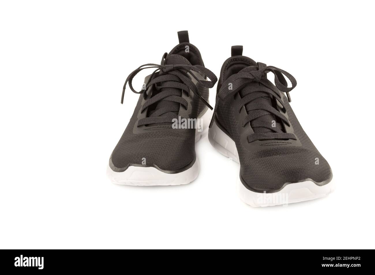 The pair of sport shoes isolated on white background Stock Photo - Alamy
