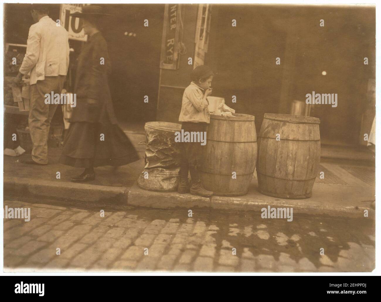 Patching Up a Meal. Boston Slums. Boston 1915 Exhibit Stock Photo - Alamy