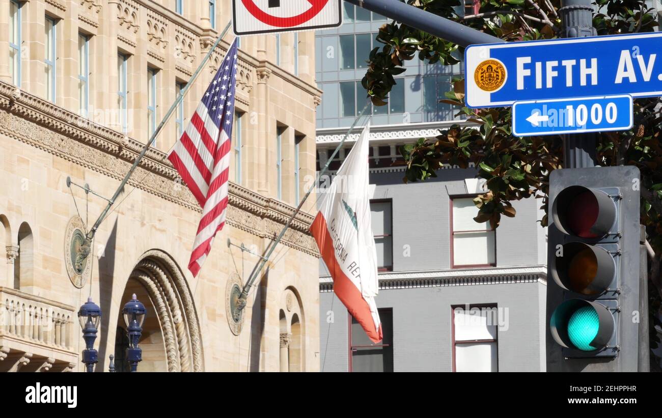 Flags of California and United States waving on flagpole in Gaslamp ...
