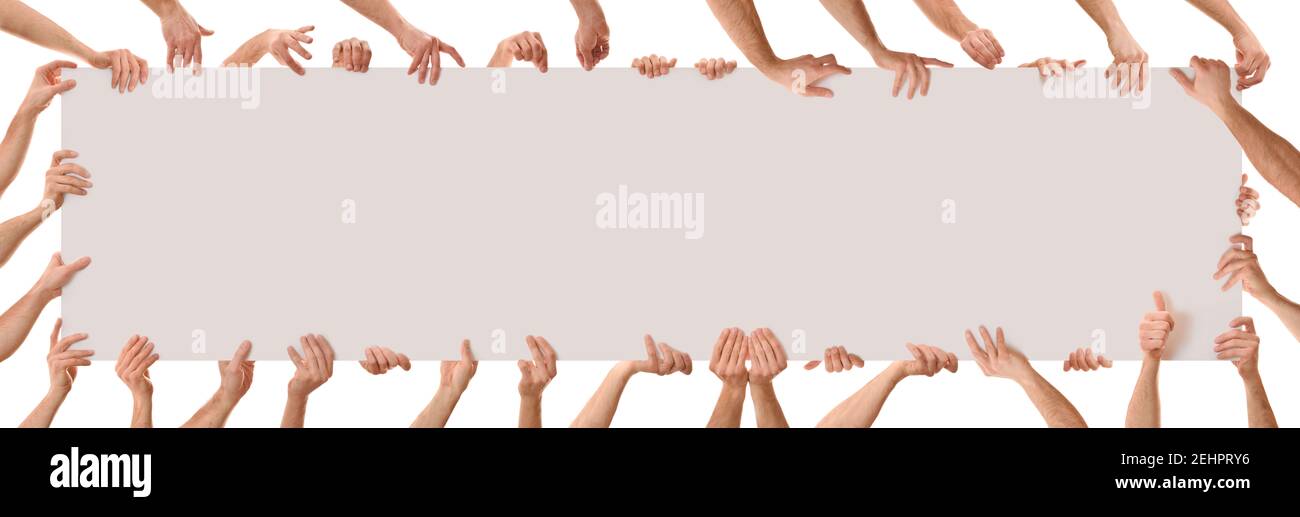 Many hands in different positions holding a poster with white isolated ...