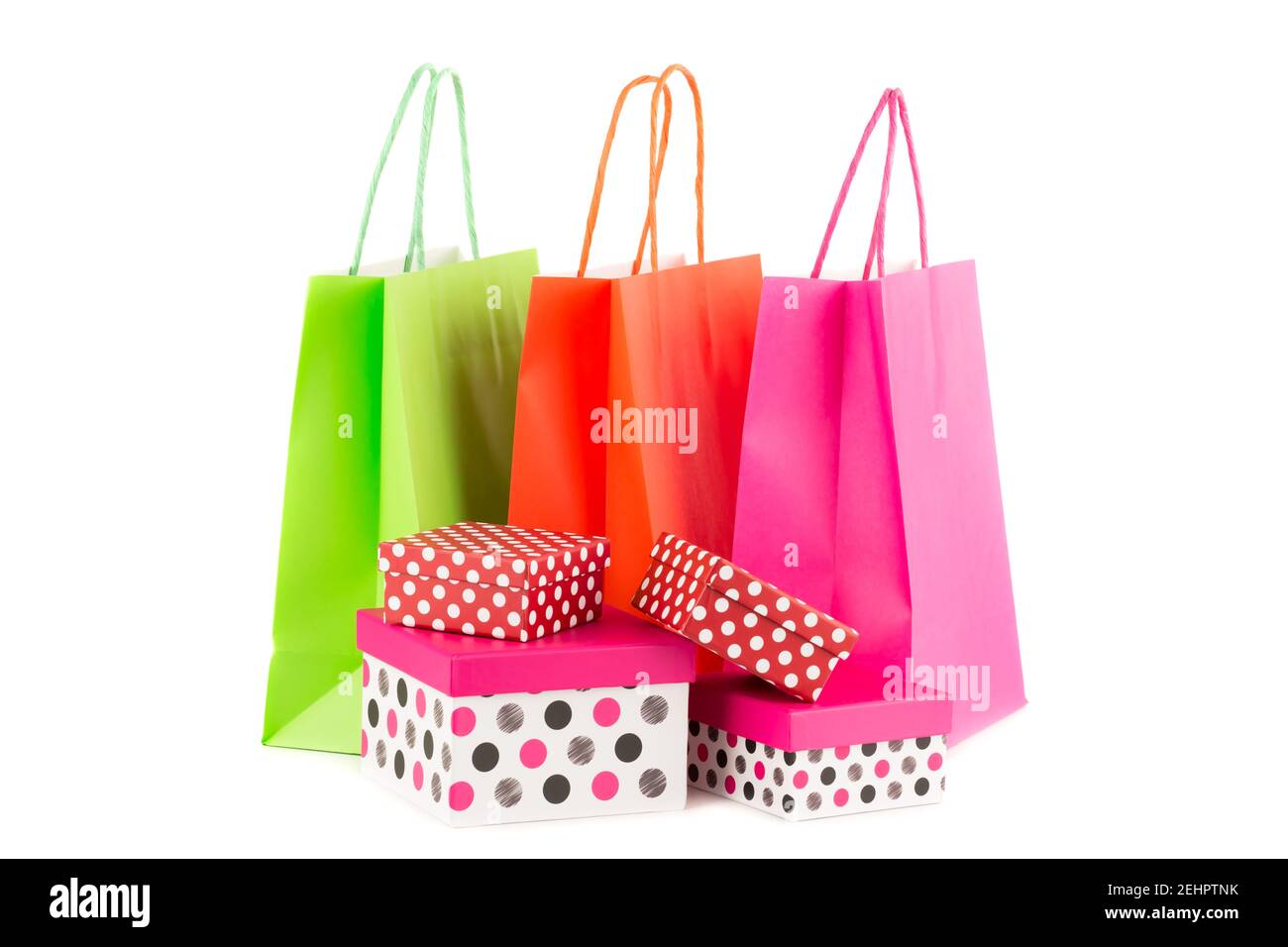 Colorful paper shopping bags and gift boxes isolated on white ...