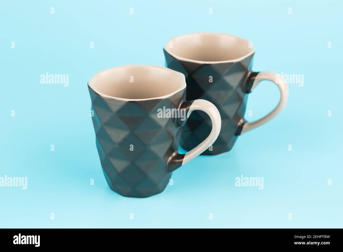 Two blue ceramic cups hi-res stock photography and images - Alamy
