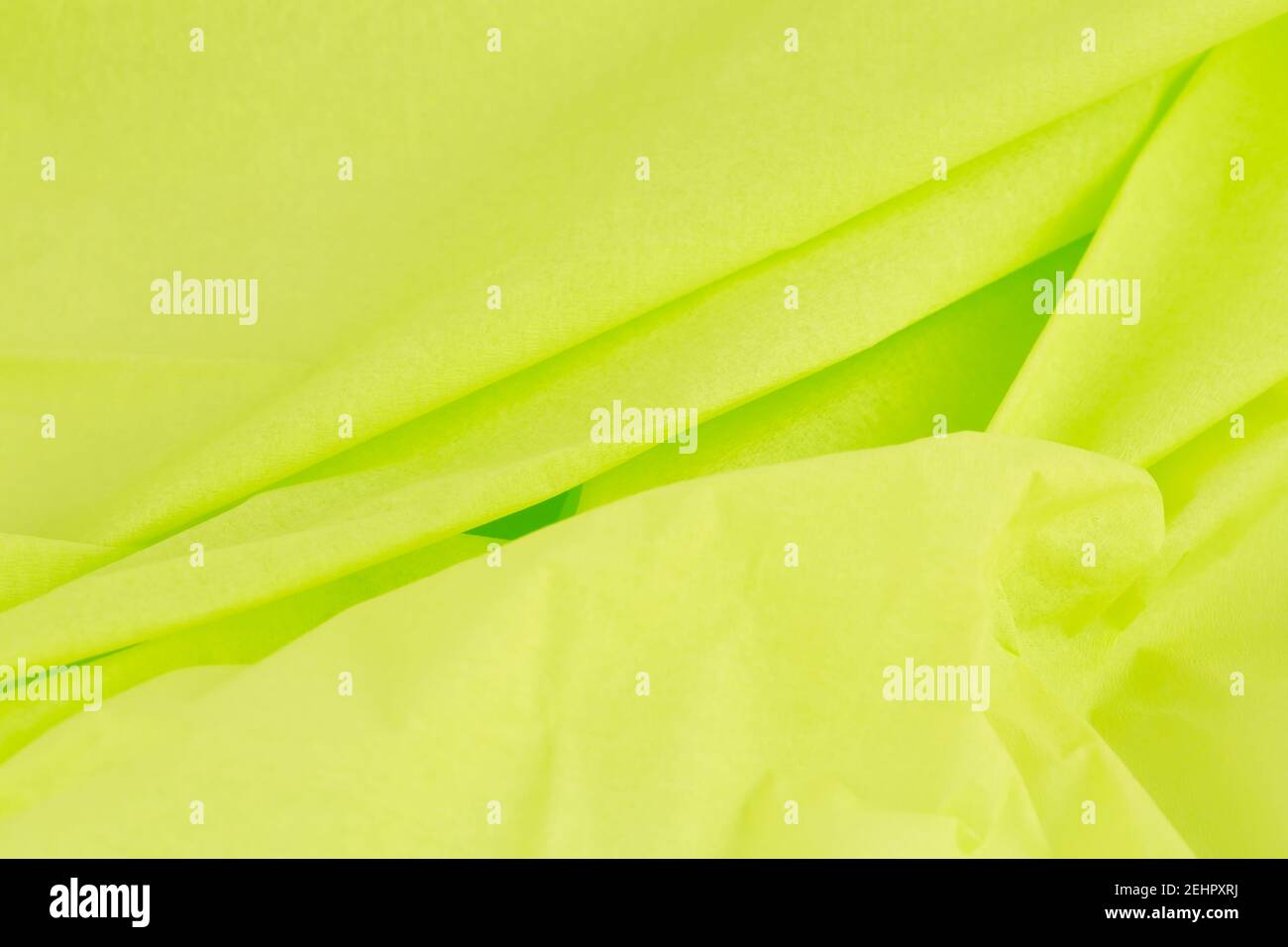 Crumpled green crepe paper texture as a background Stock Photo - Alamy