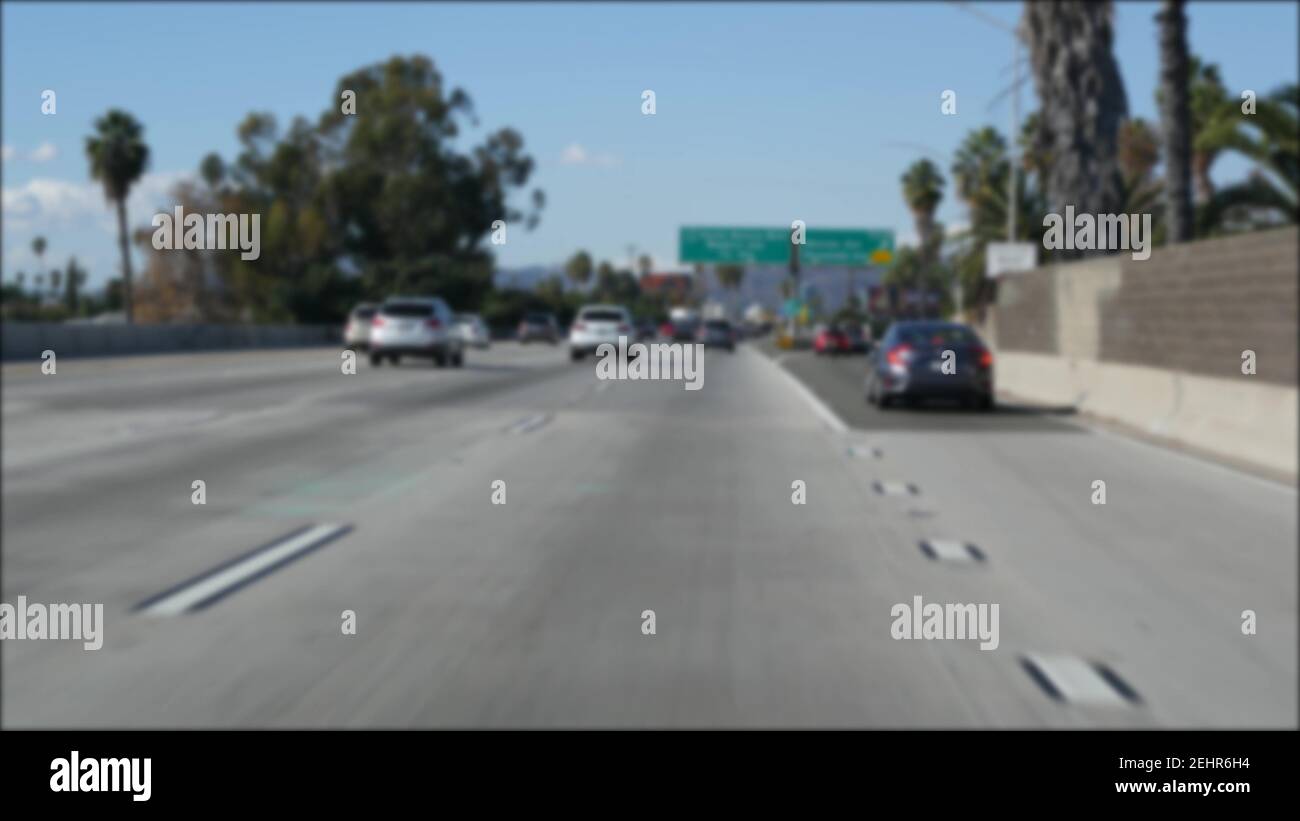 Driving on intercity freeway in Los Angeles, California USA. Defocused ...