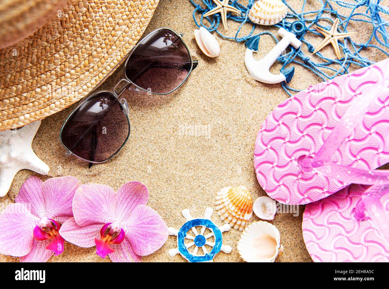 Top view of beach accesories on sands with copy space Stock Photo - Alamy