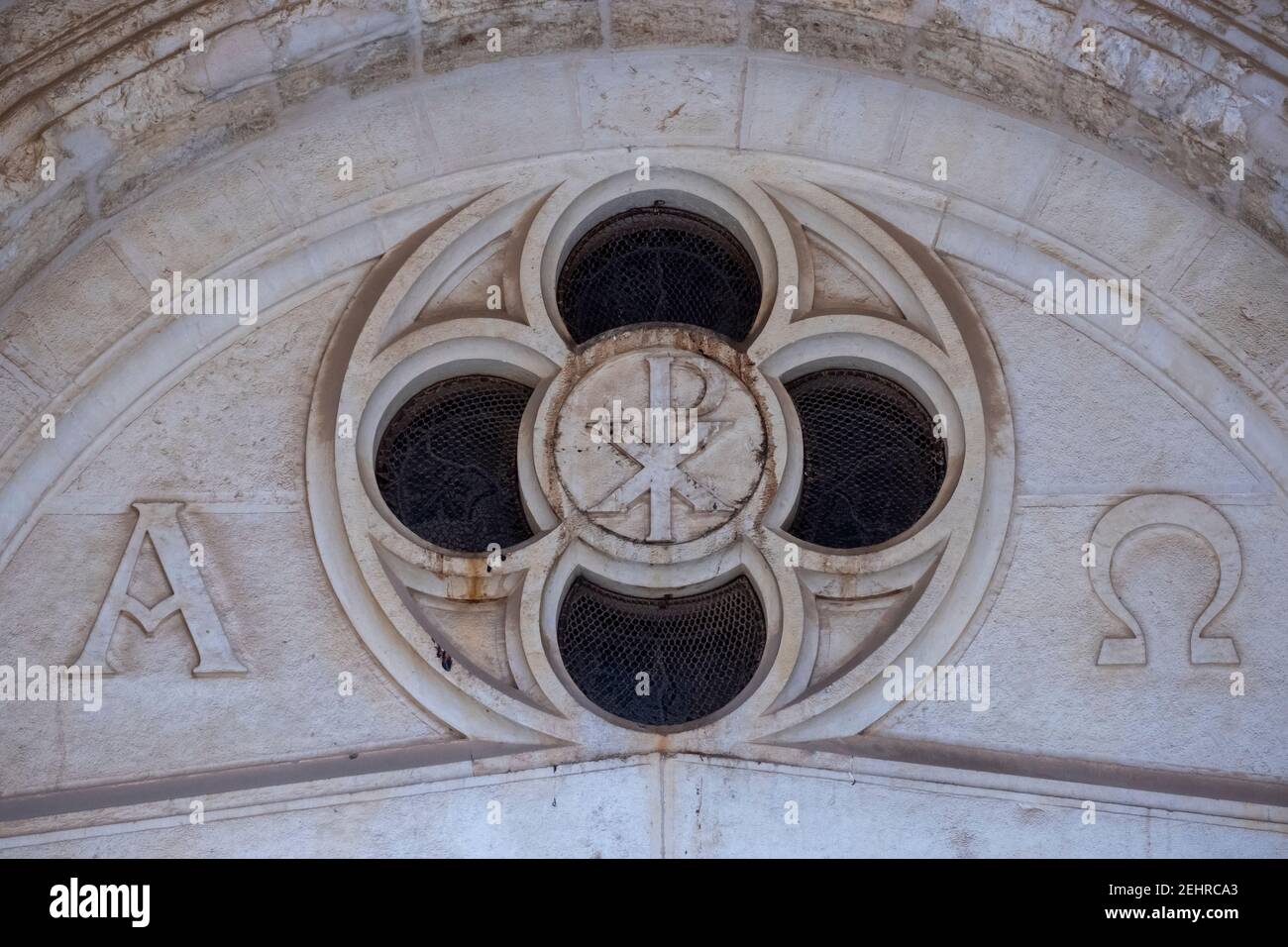 The Chi Rho christogram also known as chrismon or sigla with Alpha and ...