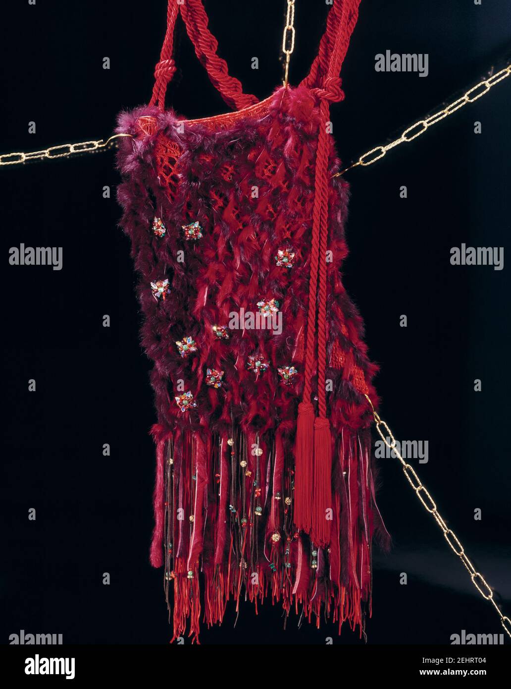 Vintage hippie knitted red bag , ethnic style, in red fabric hanging on ...