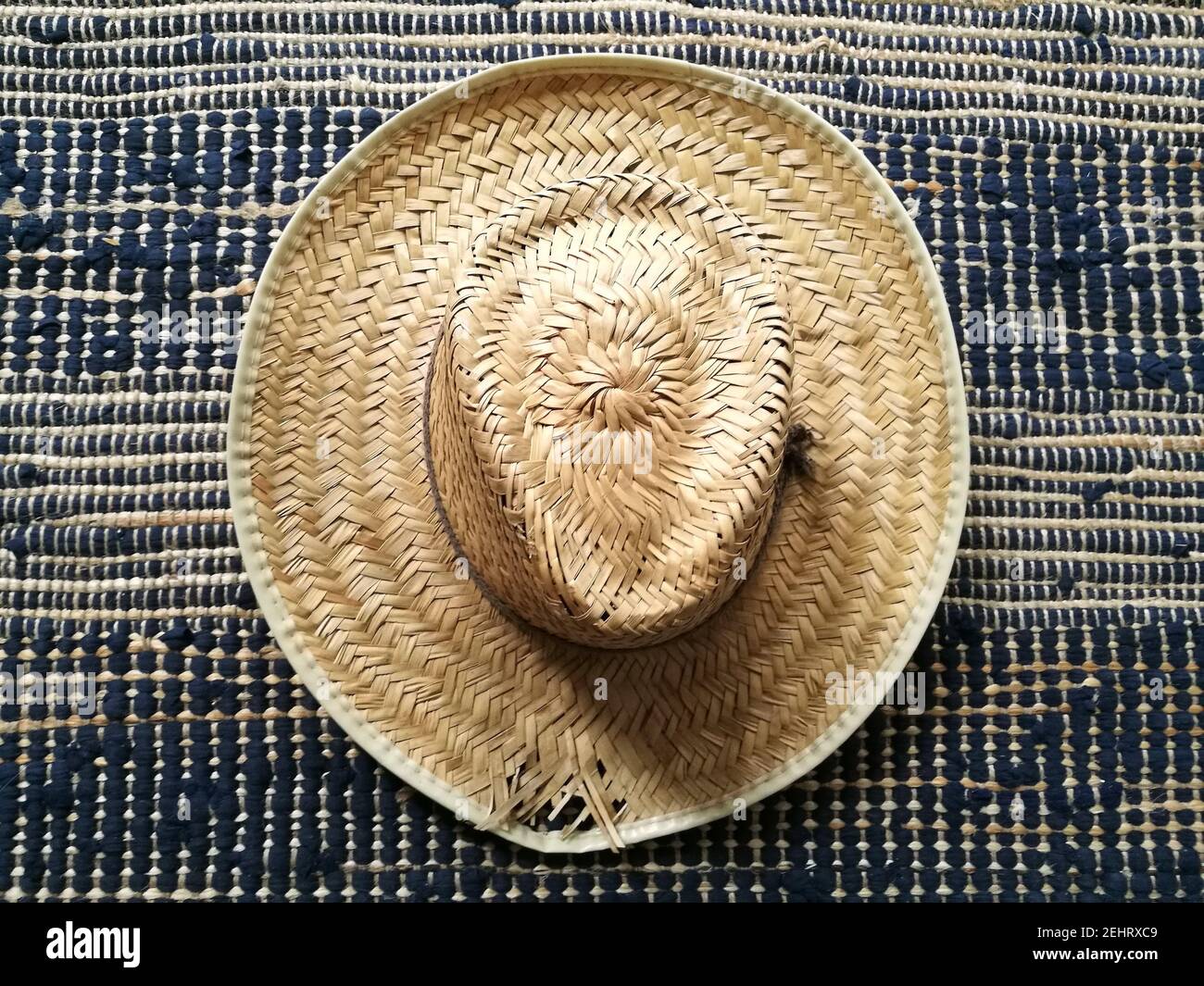 Top view of an old used woven straw hat Stock Photo - Alamy