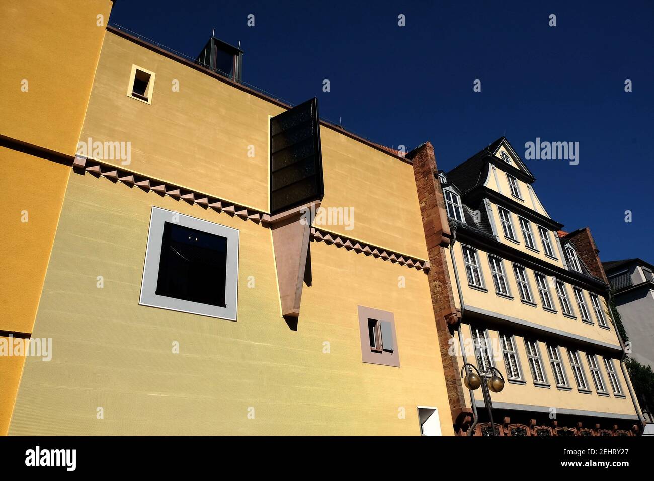Side view of a modern urban apartment building exterior Stock Photo - Alamy