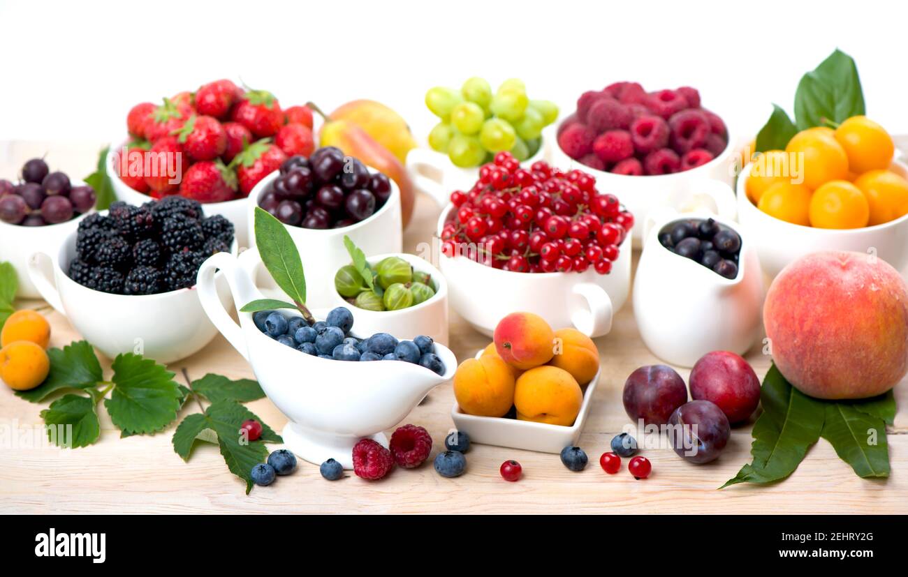 berry mix isolated on a white background Stock Photo - Alamy
