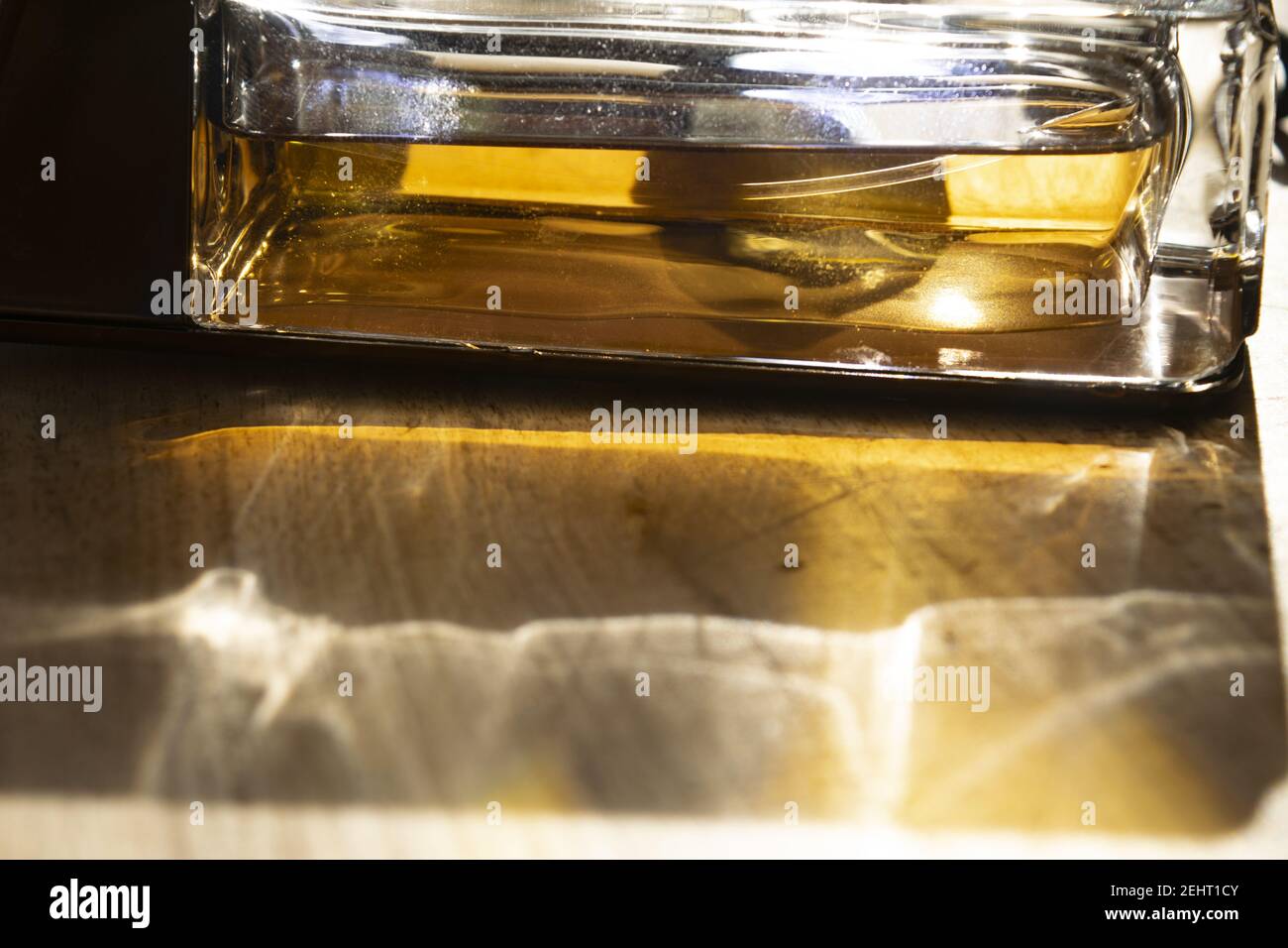 combination of lights, colors and reflections through the liquid of a ...