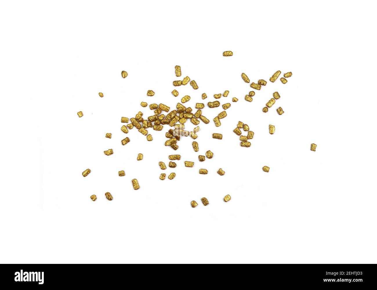Golden sprinkles isolated on white background top view. Sweet golden ...
