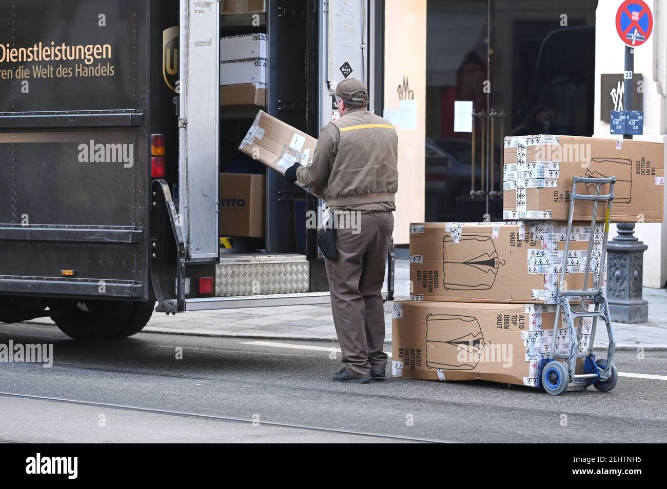 UPS parcel deliverer at work, parcel delivery service, United Parcel in ...