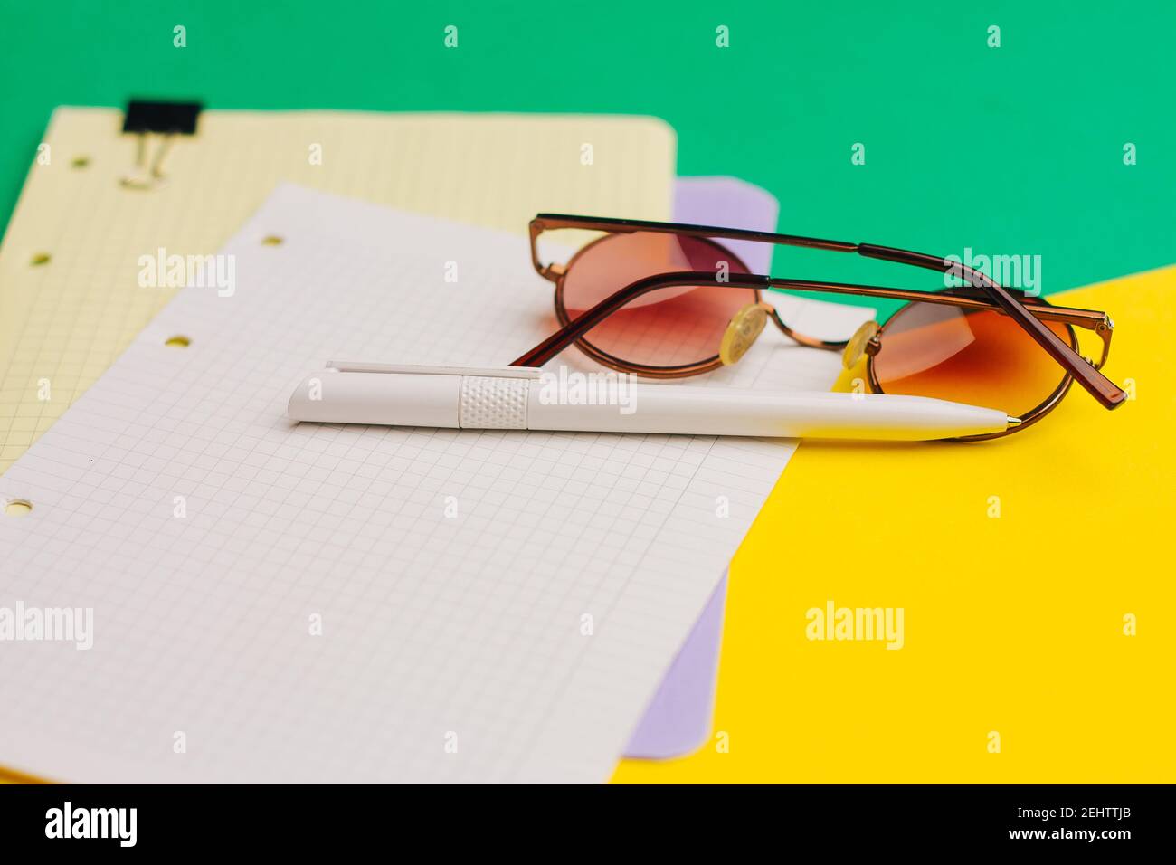 office glasses notepad paper pen the office work Stock Photo - Alamy