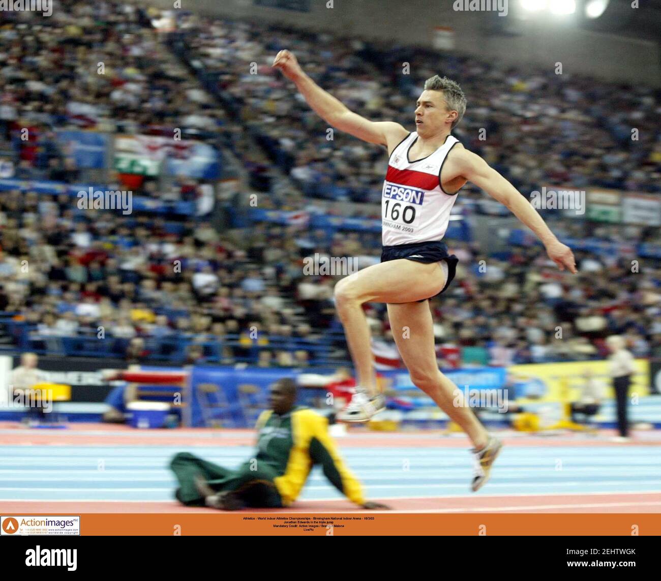 Jonathan Edwards In Action In The Triple Jump High Resolution Stock ...