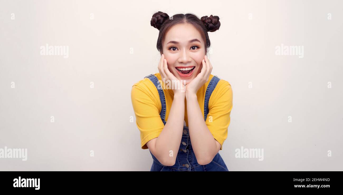 Stunning and cheerful young student girl optimistic dressed isolated ...