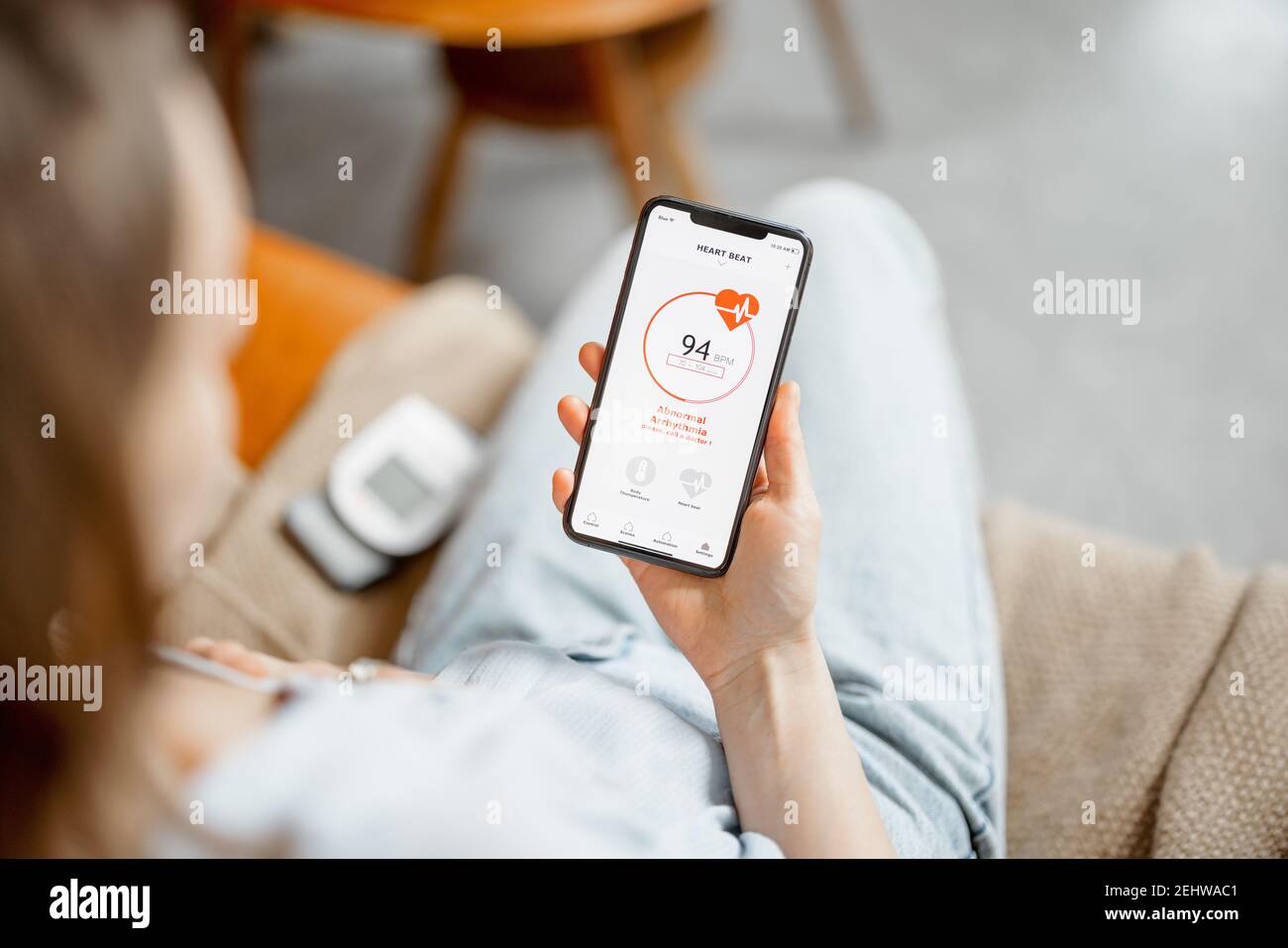 Woman measure heart rate with smart technology Stock Photo - Alamy