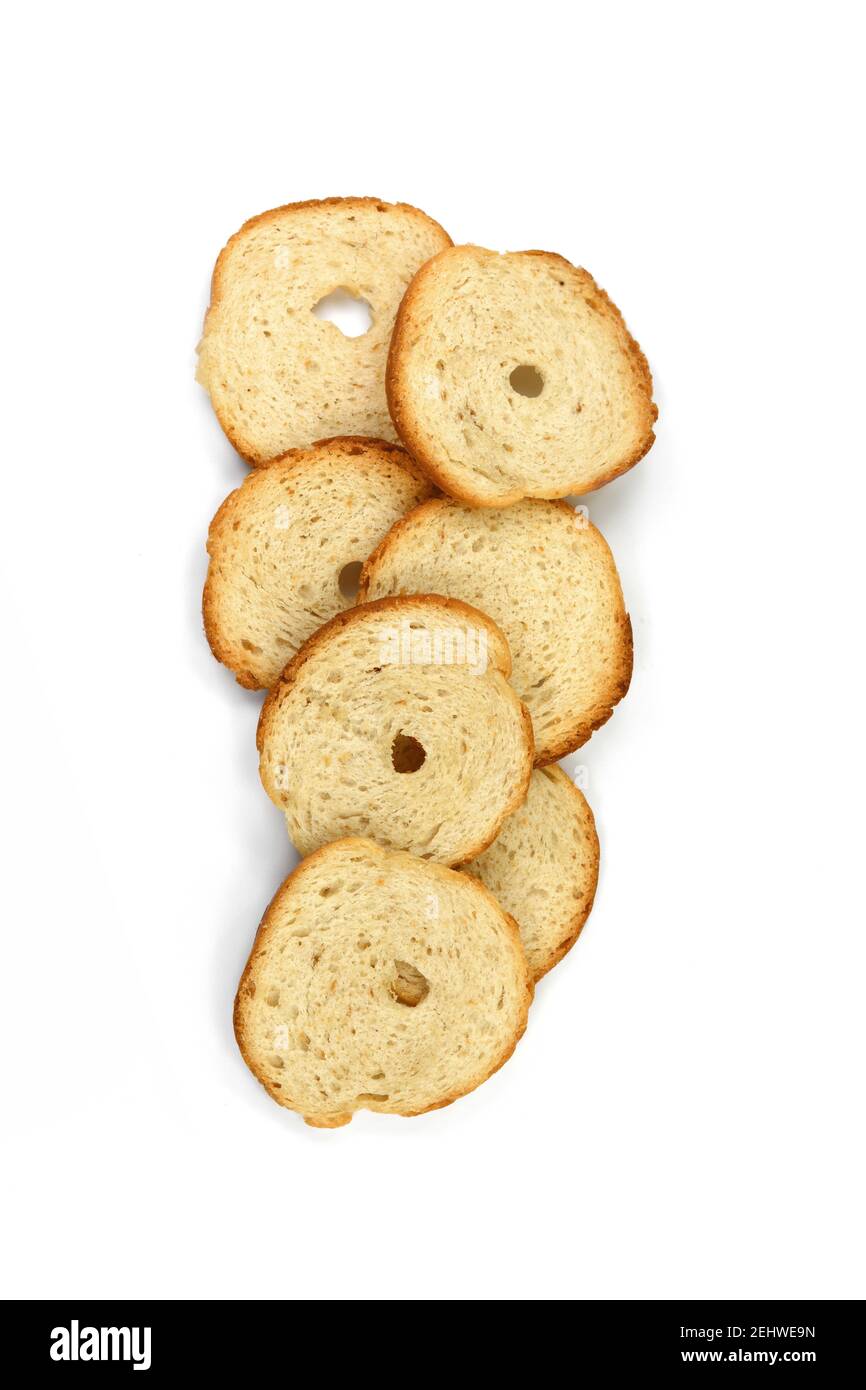 Bake rolls. Mini bread chips isolated on white background Stock Photo ...