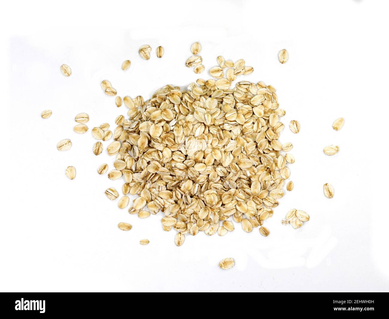 Rye oat flakes isolated on white , macro close up Stock Photo - Alamy
