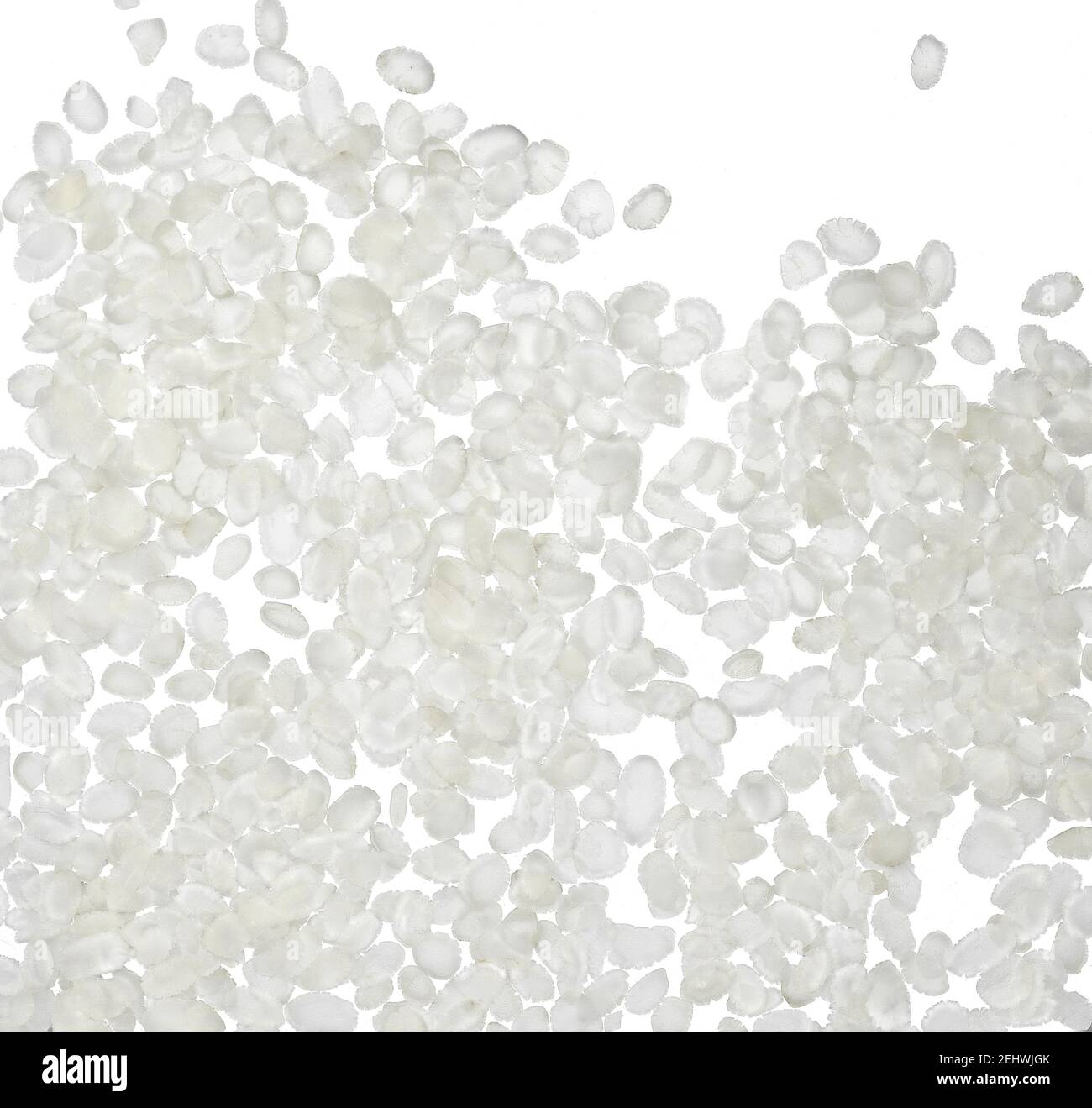 flattened rice flakes isolated on white Stock Photo - Alamy