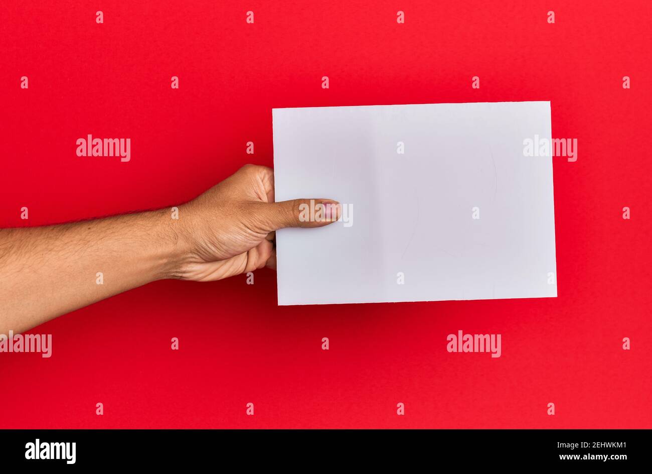 Young hispanic man holding empty hi-res stock photography and images ...
