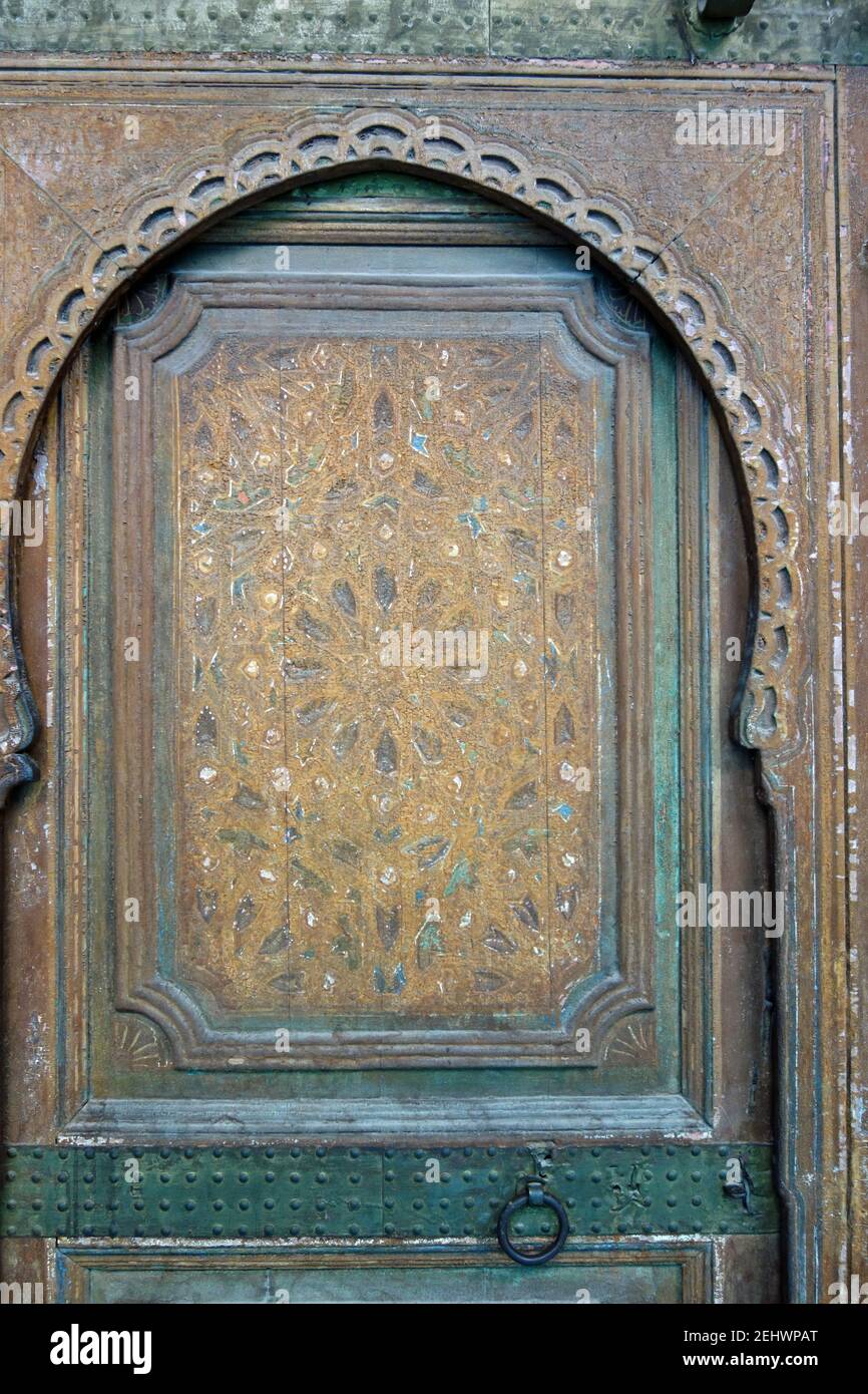 green and brown inlaid doors and surrounds in north Africa Stock Photo ...