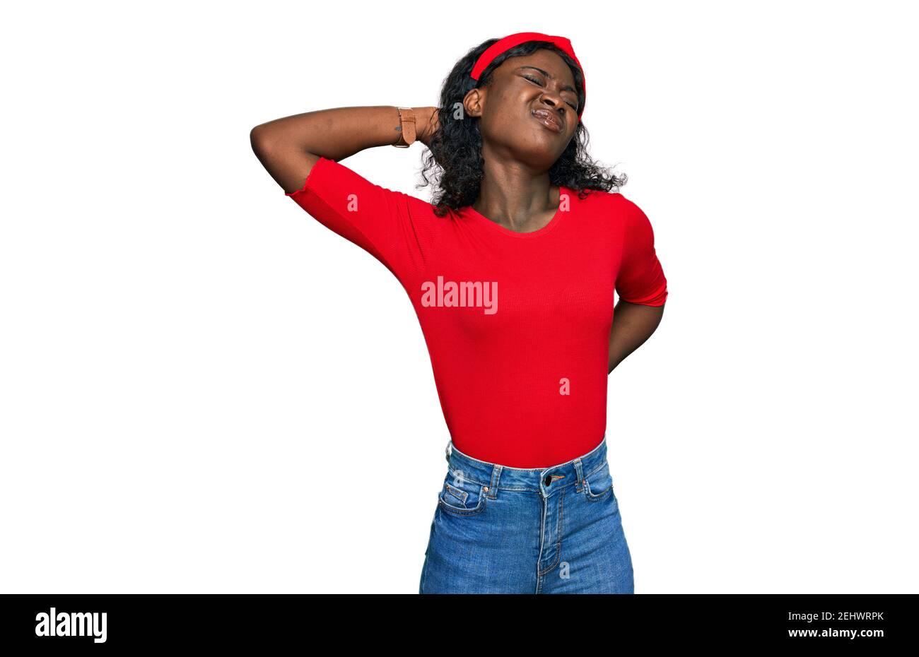 Beautiful african young woman wearing casual clothes suffering of neck ...
