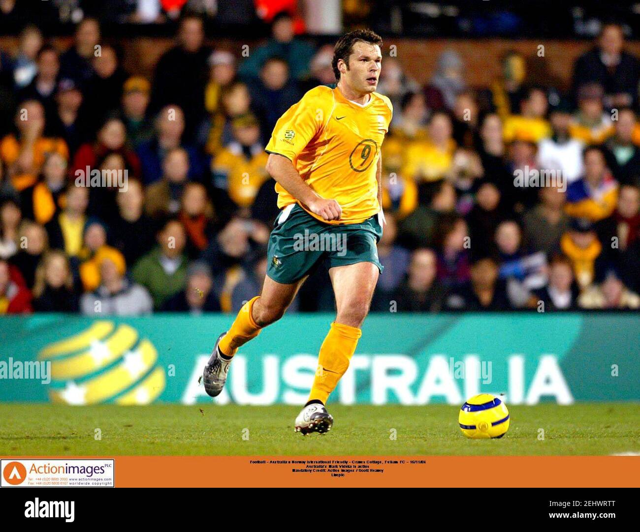 Australias mark viduka in action hi-res stock photography and images ...