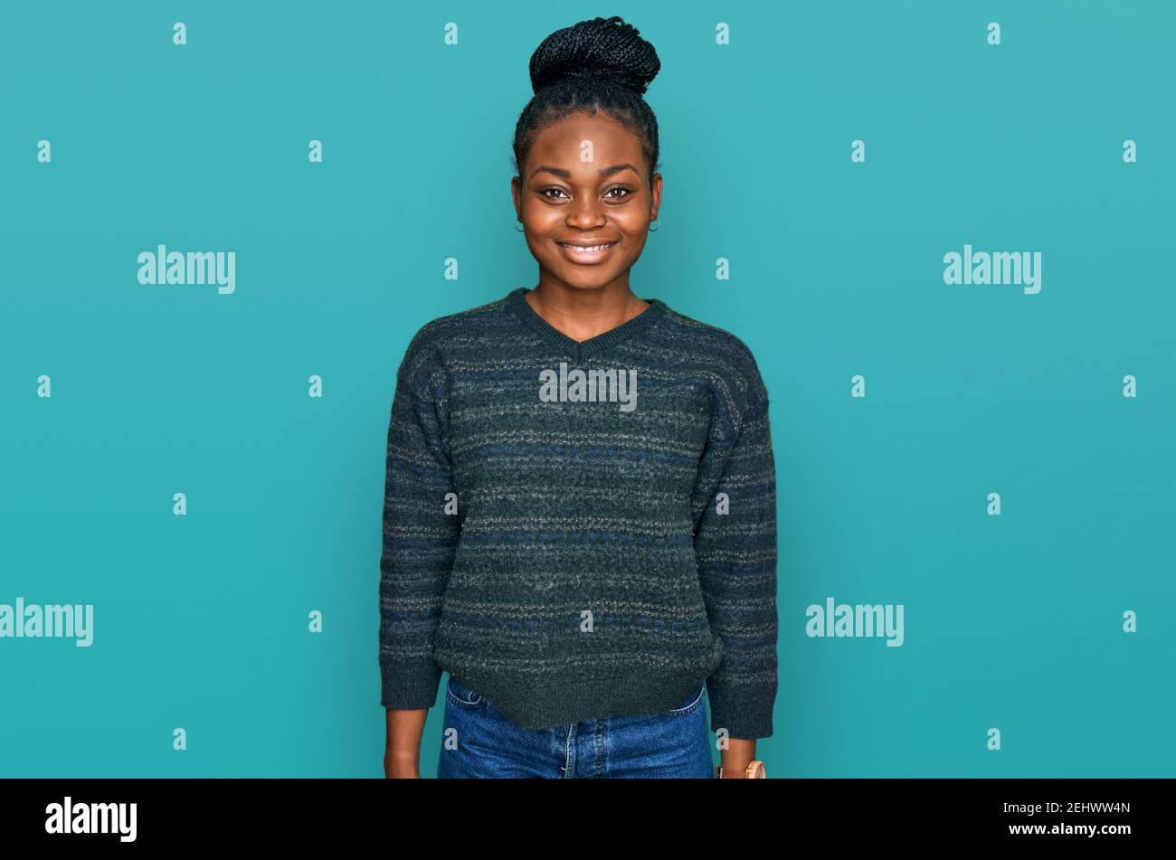 Young african american woman wearing casual clothes with a happy and ...