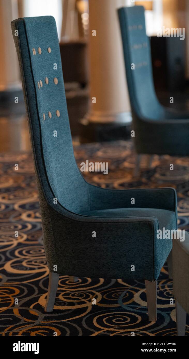 Modern long-back armchair in the hall Stock Photo - Alamy