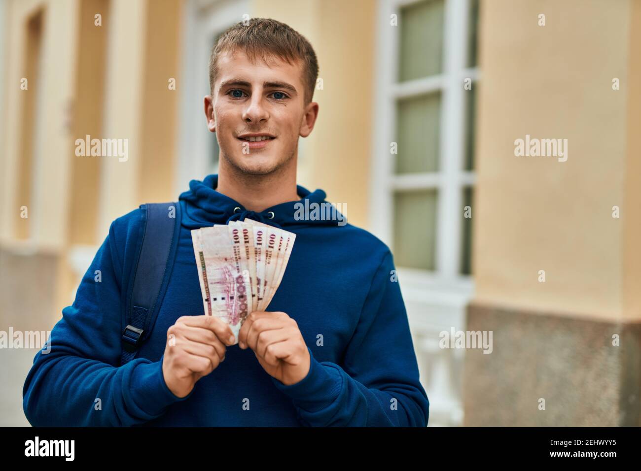 Man studying at banknote hi-res stock photography and images - Alamy