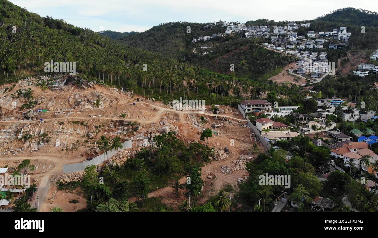 Tropical terrain covered with endangered forests and luxury villas ...