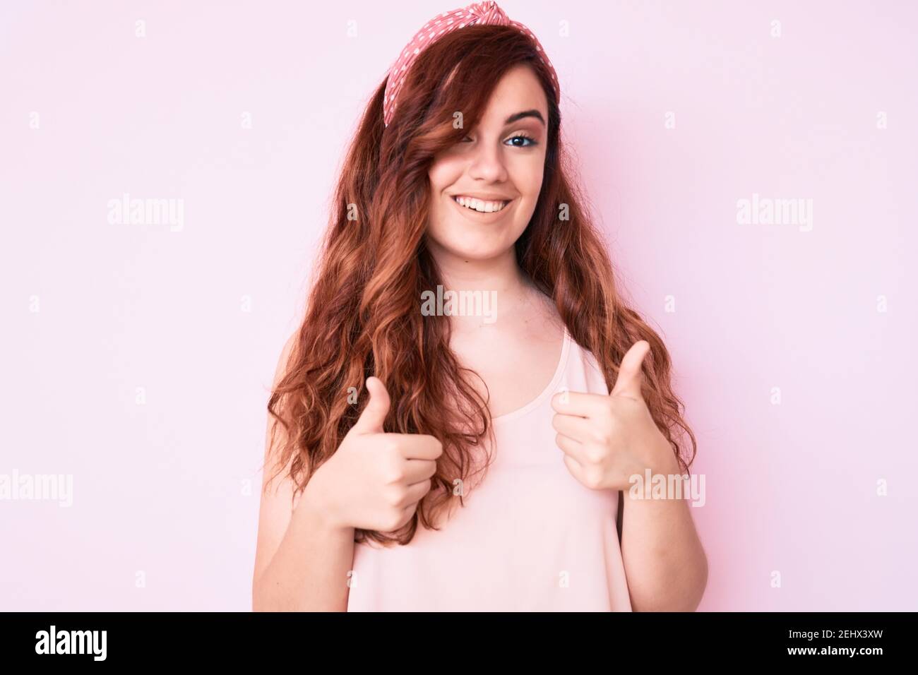 Young beautiful woman wearing casual clothes success sign doing ...