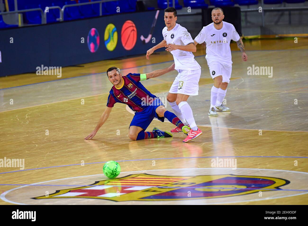 Dyego Henrique Zuffo of FC Barcelona and Carlos Ortiz of ACCS Paris ...