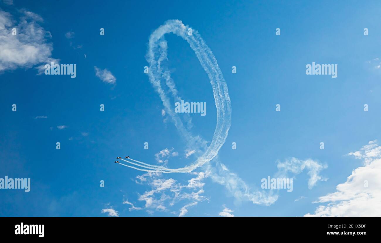 Stunt aircrafts performing incredible aerobatics. Aerial manoeuvre ...