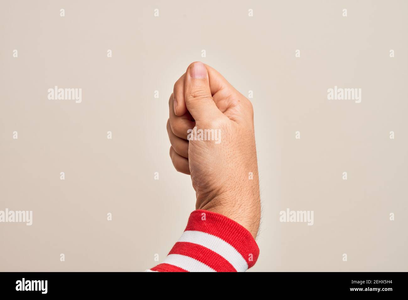 Hand of caucasian young man showing fingers over isolated white ...