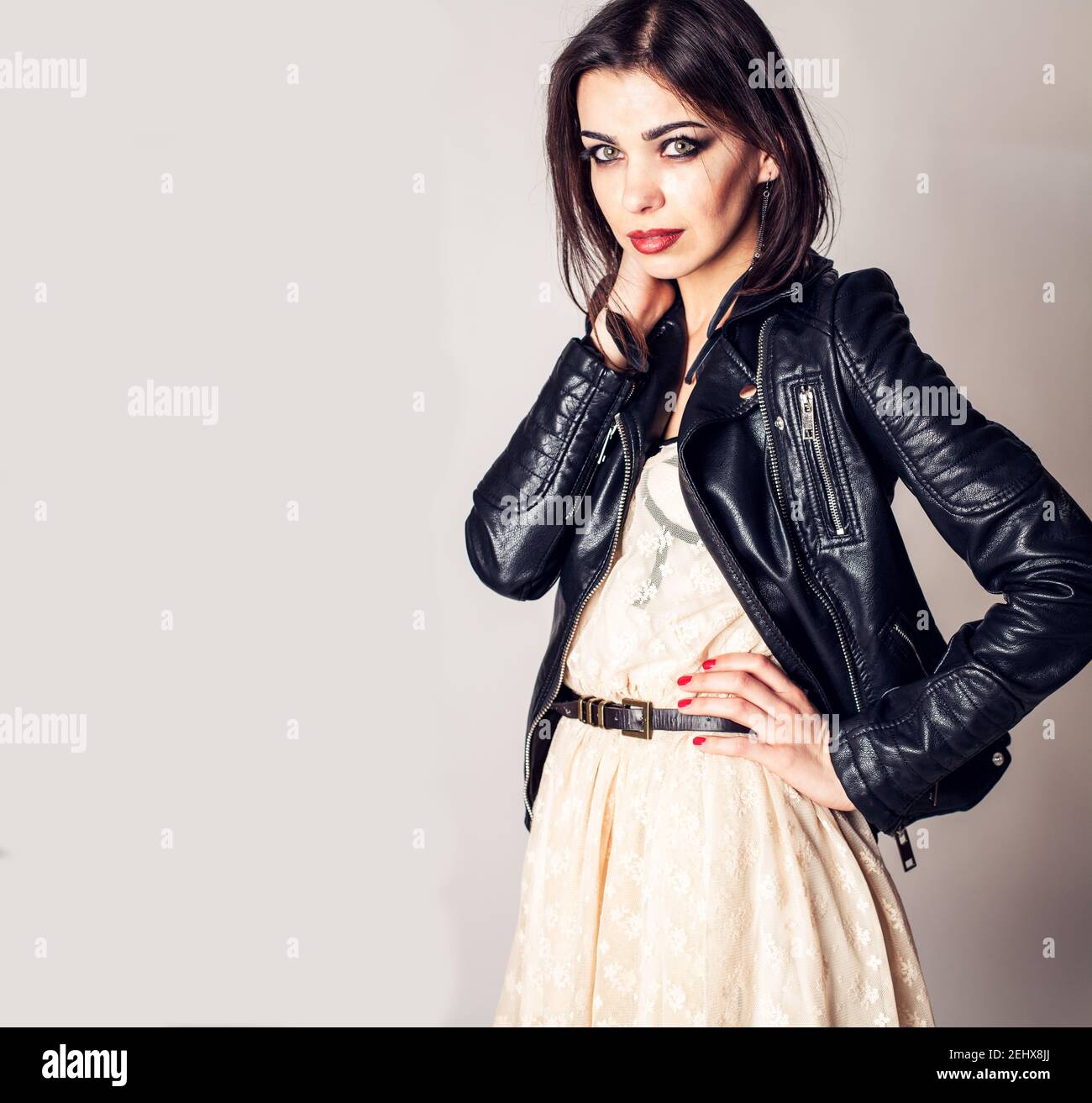 Rock style beautiful young woman and Stock Photo - Alamy