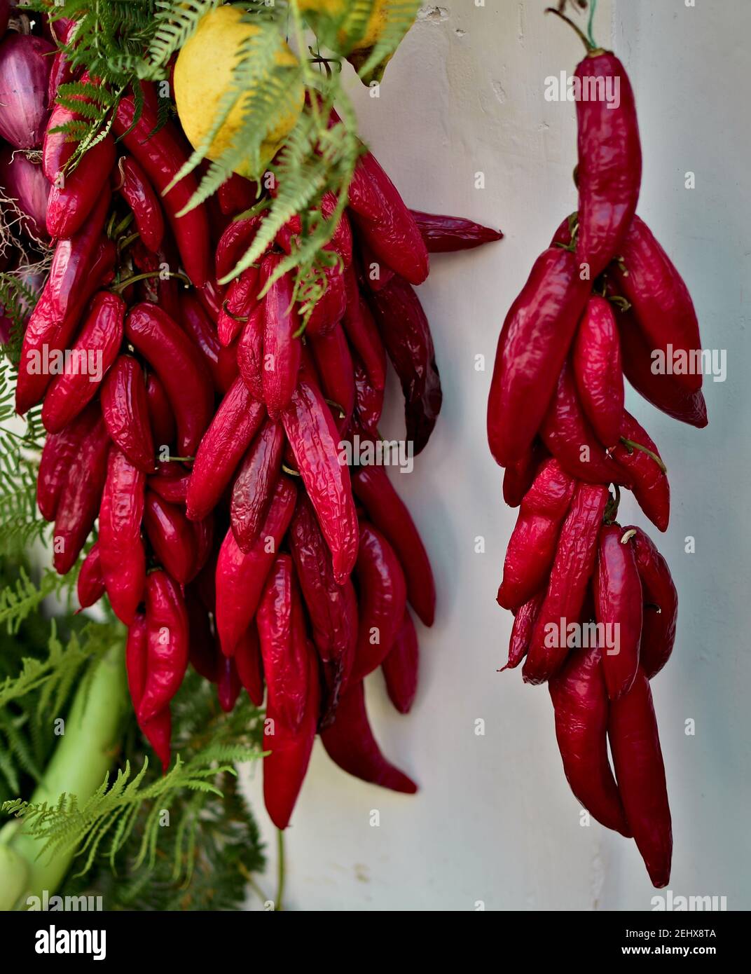 Strings of red hi-res stock photography and images - Alamy
