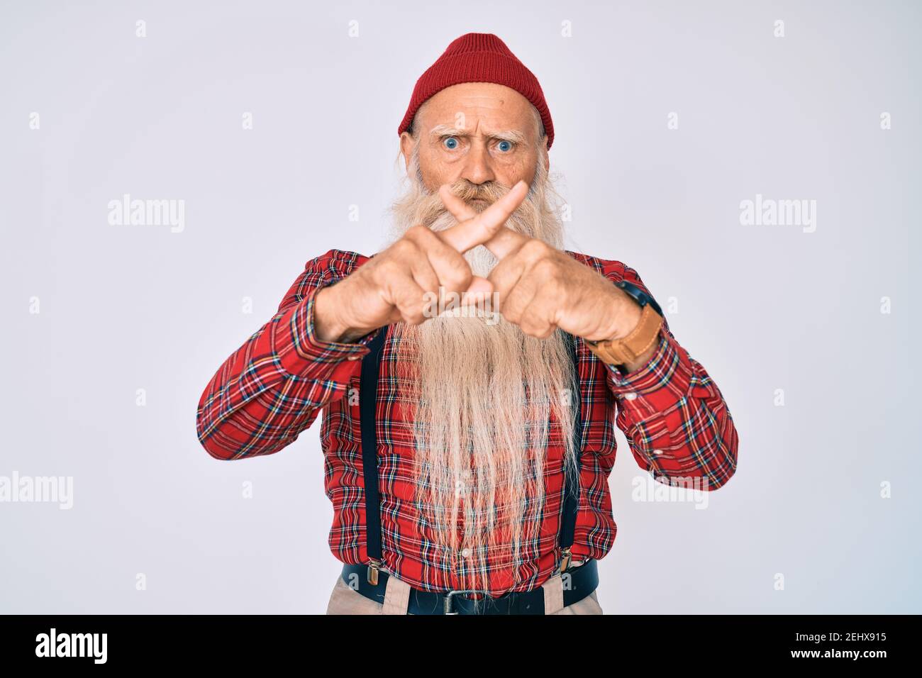Old senior man with grey hair and long beard wearing hipster look with ...