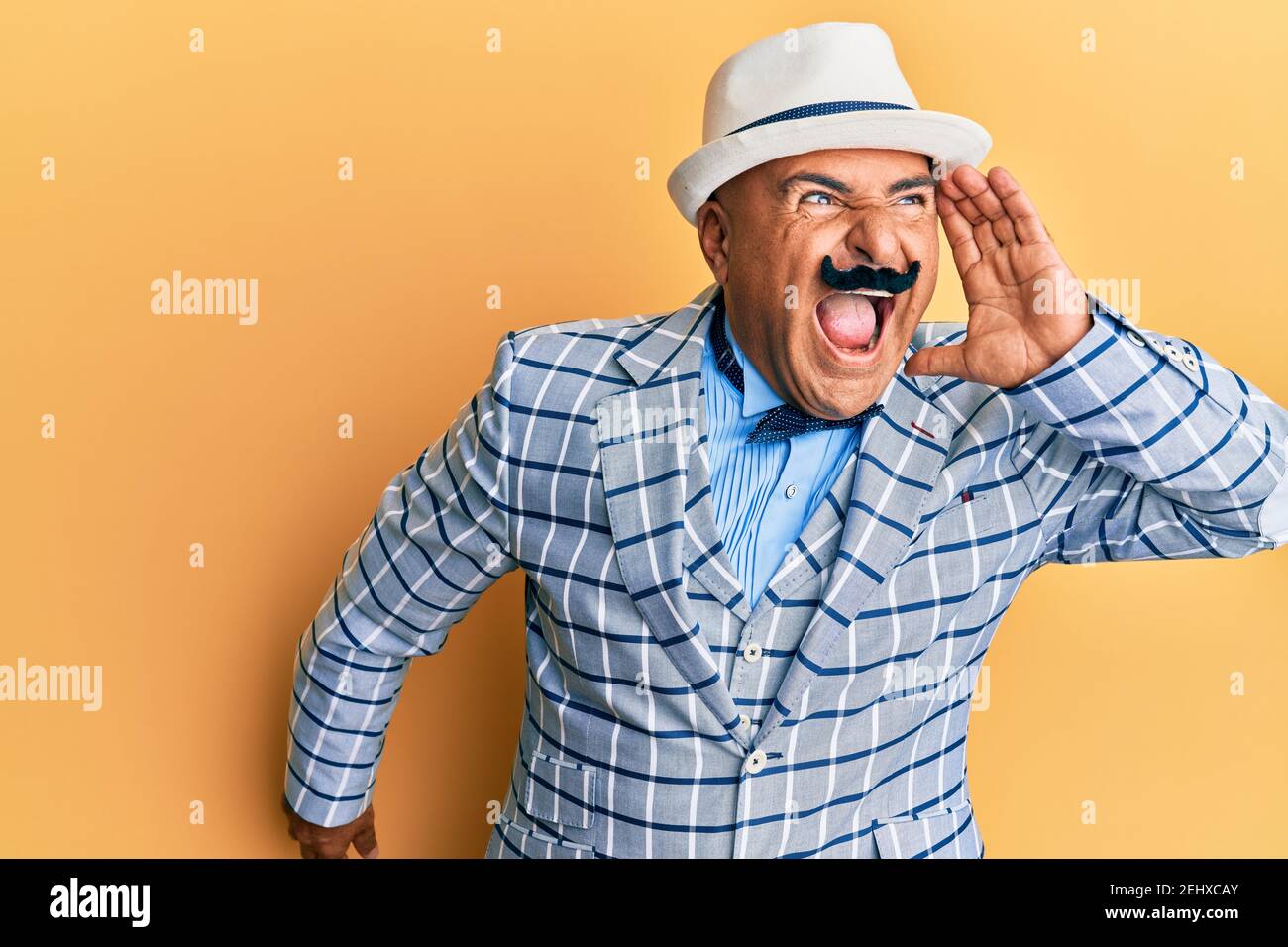 Mature middle east man with mustache wearing vintage and elegant ...