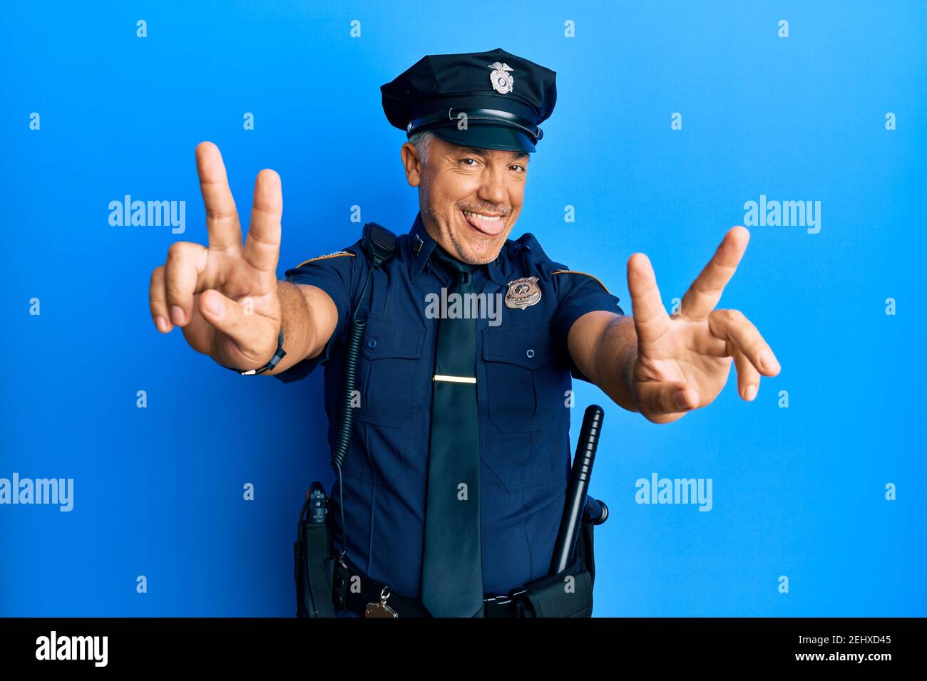 Policeman v sign hi-res stock photography and images - Alamy