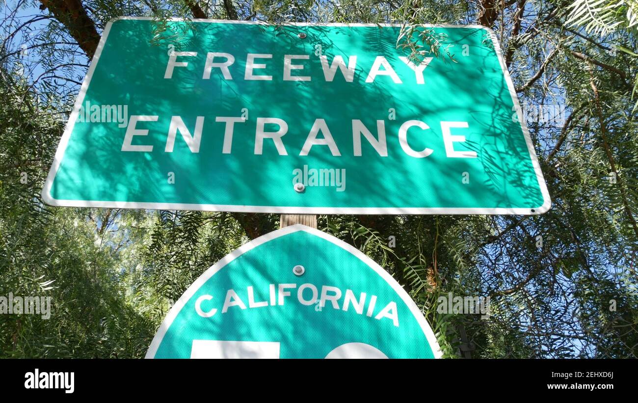 Freeway entrance sign on interchange crossraod in San Diego county ...