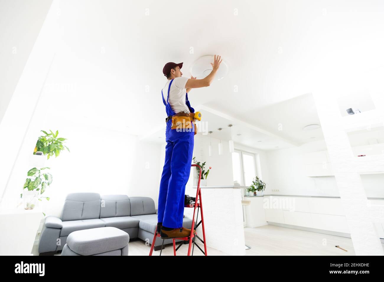 Electrician at work. Service for the repair of electrical wiring and ...