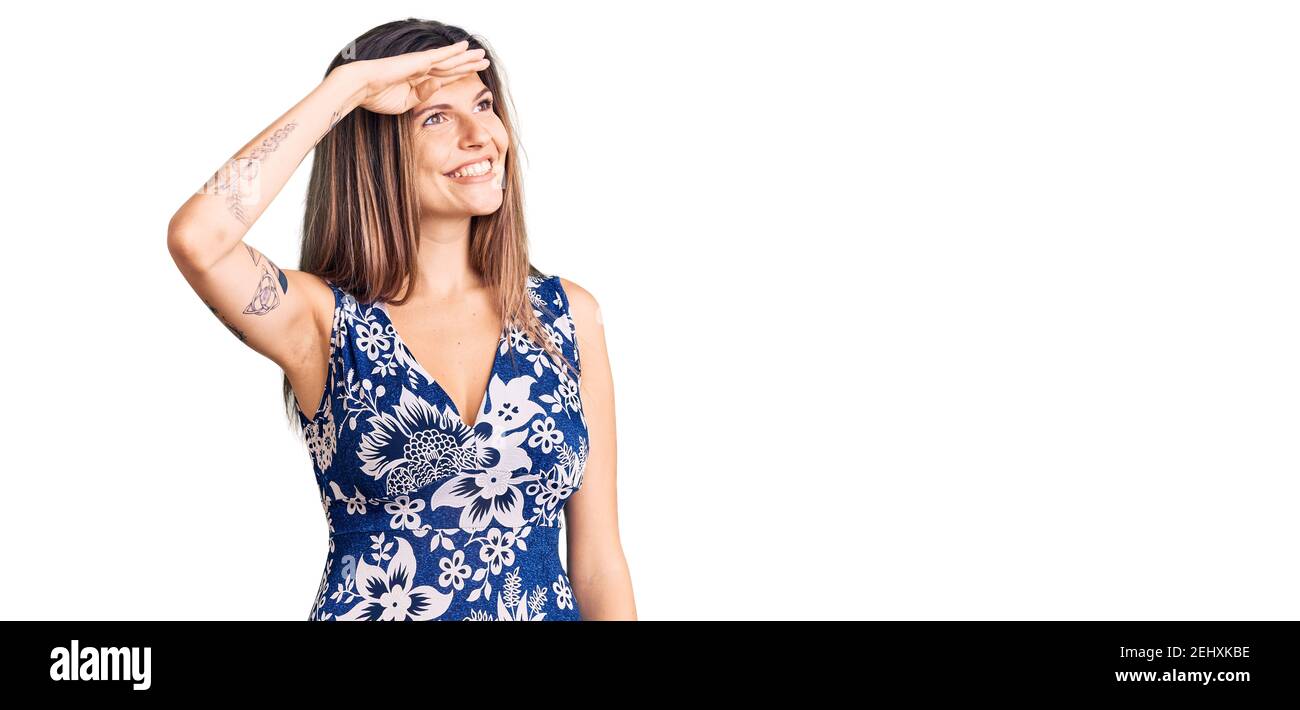 Beautiful caucasian woman wearing summer dress very happy and smiling ...
