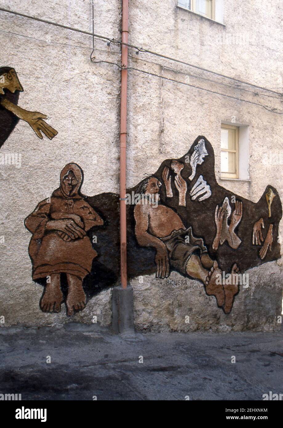 Orgosolo, Sardinia, Italy. Typical street art "Murales" (scanned from ...