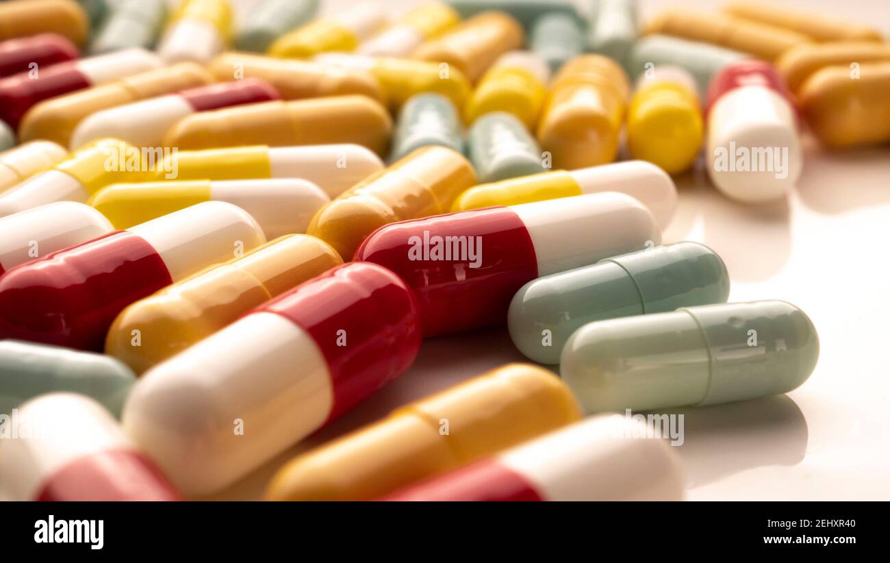 Pills. Capsules. Vitamins. Colored pills. A bunch of tablet pills Stock ...