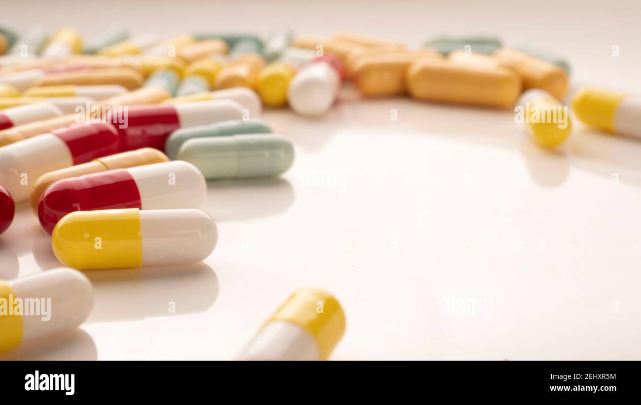 Pills capsules vitamins colored hi-res stock photography and images - Alamy