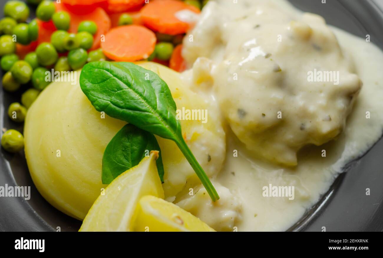 Cod Mornay, flaky cod with a creamy cheese sauce, with mashed potato ...